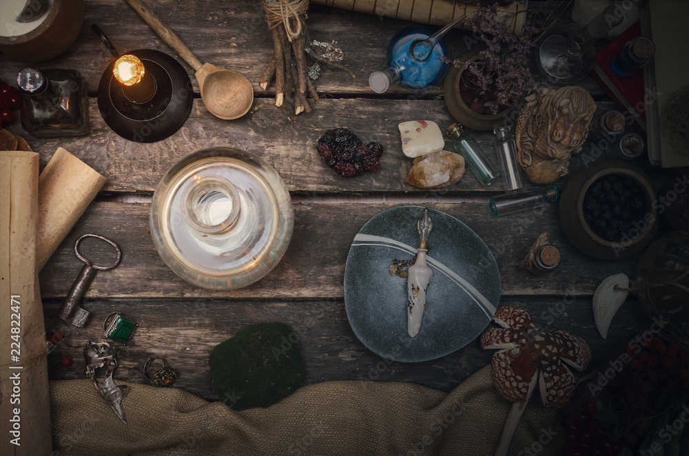 Magic potion in the vial on the wizard table. Witchcraft concept. Stock ...