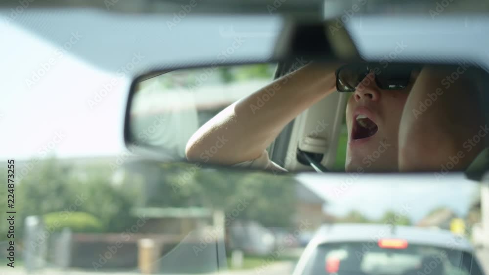SLOW MOTION, CLOSE UP, DOF: Reflection of a frustrated young man ...