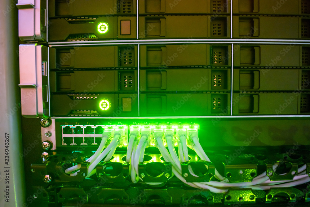 Cabling in the server cabinet. The patch panel of the server room of ...