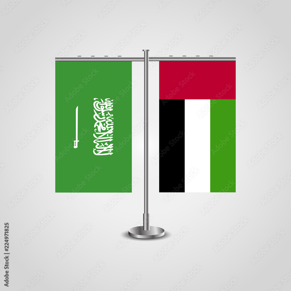 Table stand with flags of Saudi Arabia and United Arab Emirates.Two ...