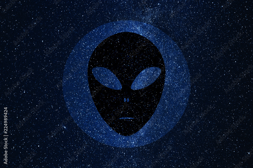 Silhouette of alien against dark space background. World UFO Day. Stock ...