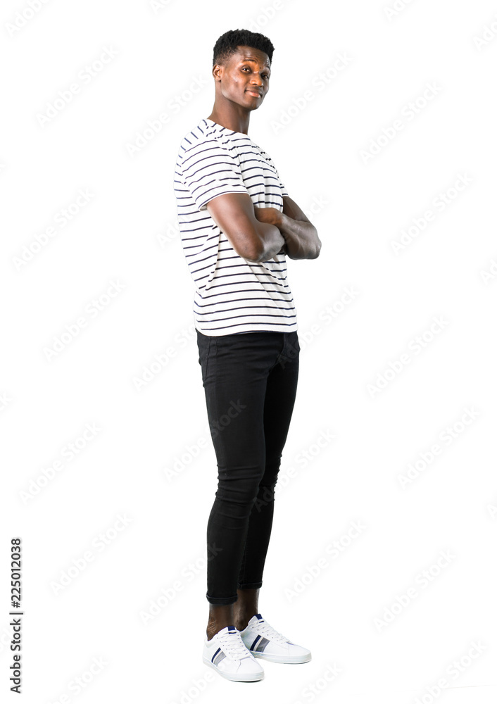 Full body of Dark skinned man with striped shirt keeping the arms ...