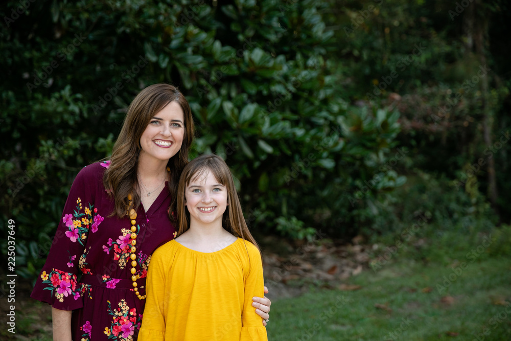 Mother and Tween Daughter Outside Stock Photo | Adobe Stock