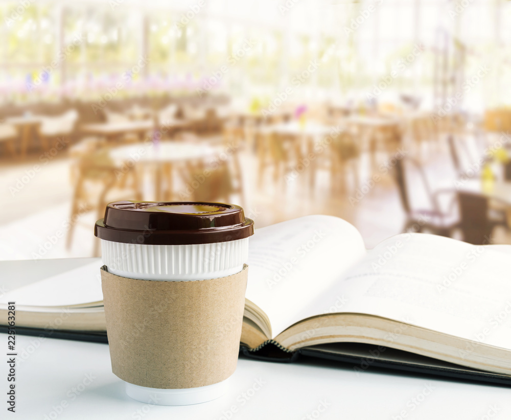 Paper coffee cup or disposable cup on the white table on café coffee ...