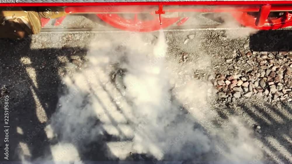 Closeup of an old train with valve blowing steam Stock Video | Adobe Stock