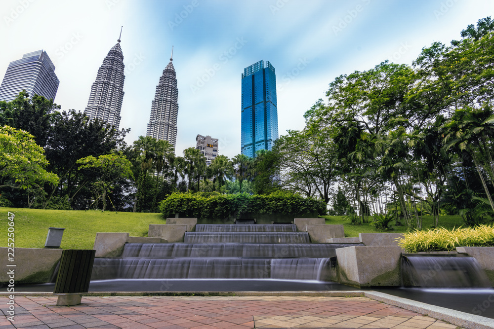 Far away view of the Petronas Twin Towers from KLCC Park. Stock Photo ...