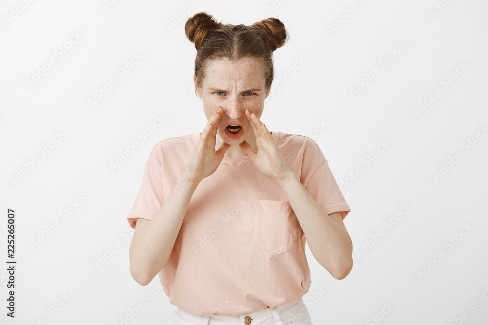 Rude and angry girl scolding and scorning classmate, yelling cursing ...