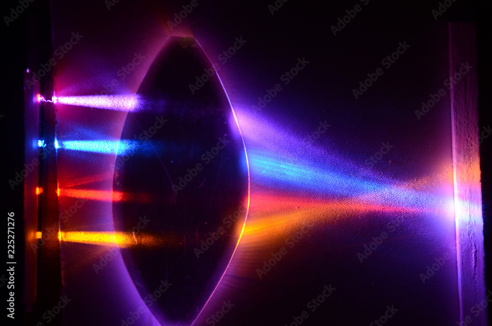 Light beams in colorblind-friendly colors pass trough a demonstration ...