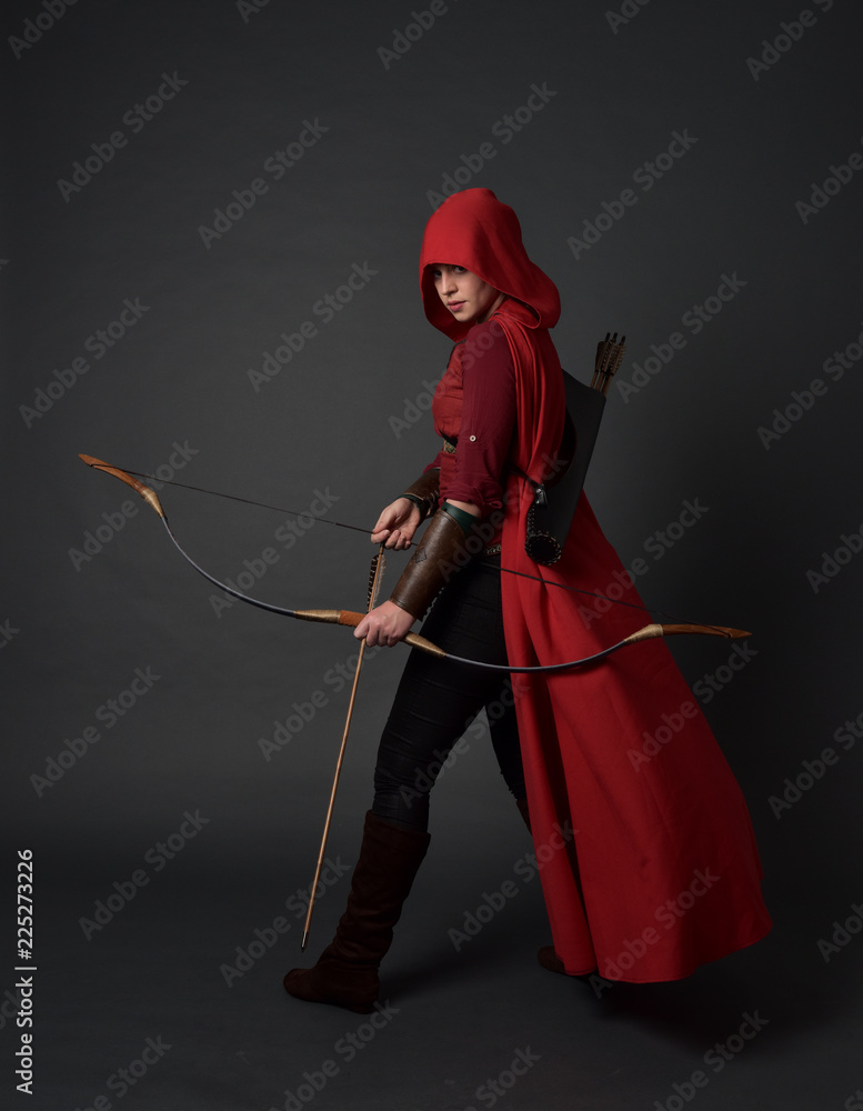 full length portrait of brunette girl wearing red medieval costume and ...