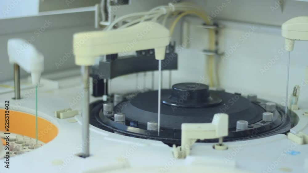 Modern robotic machine for blood centrifugation and urinalysis. Medical ...