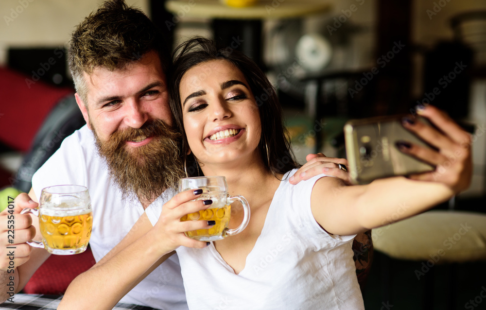Couple in love on date drinks beer. Best friends or lovers drinking ...