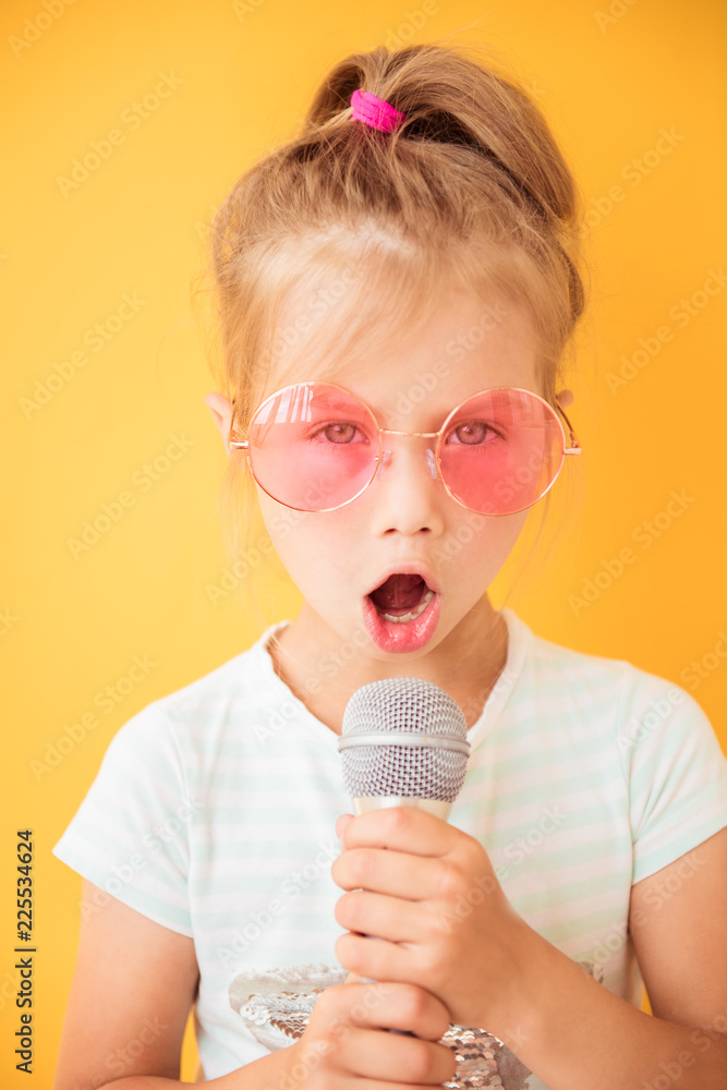Girl Singing Into Microphone