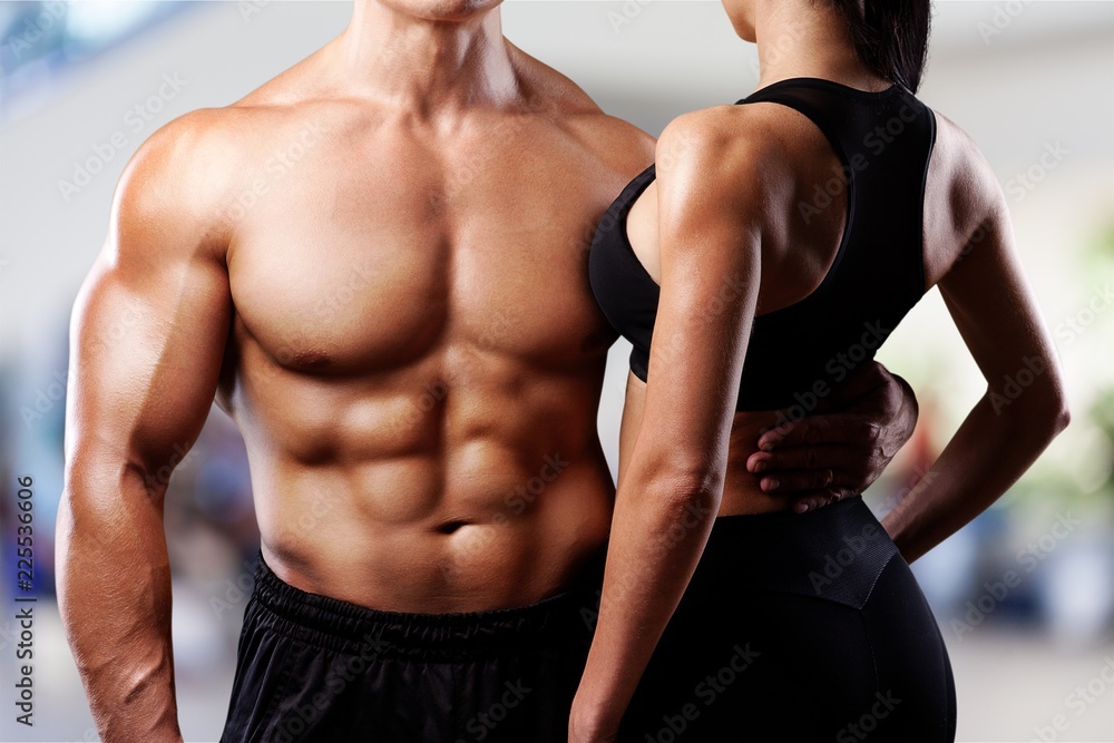 Fotografia do Stock: Bodybuilder couple. | Adobe Stock