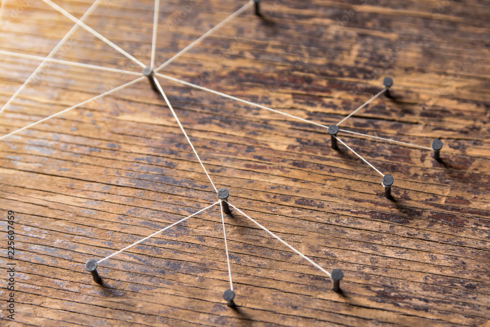 Connecting networks concept - network connected with yarn white on ...