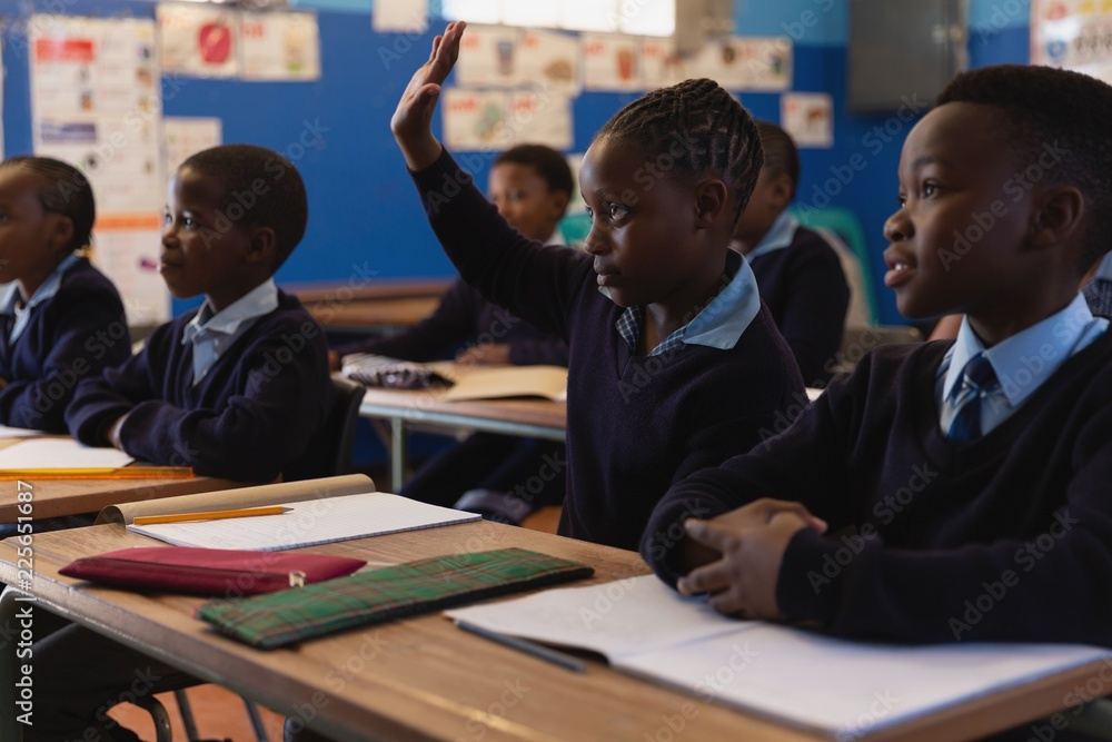 Students studying in classroom Stock Photo | Adobe Stock