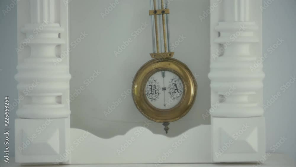 Vintage wall clock. Pendulum clock with ringing in vintage interior ...