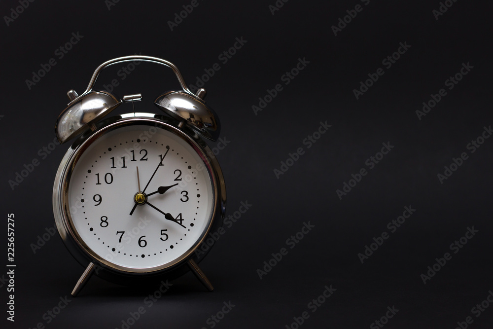Retro alarm clock in dark background.For time concept. Stock Photo ...