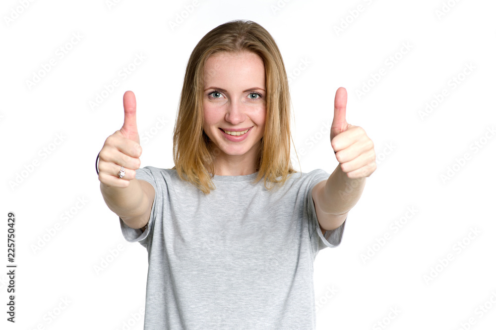 Happy woman showing thumbs up. Smiling woman isolated white background ...