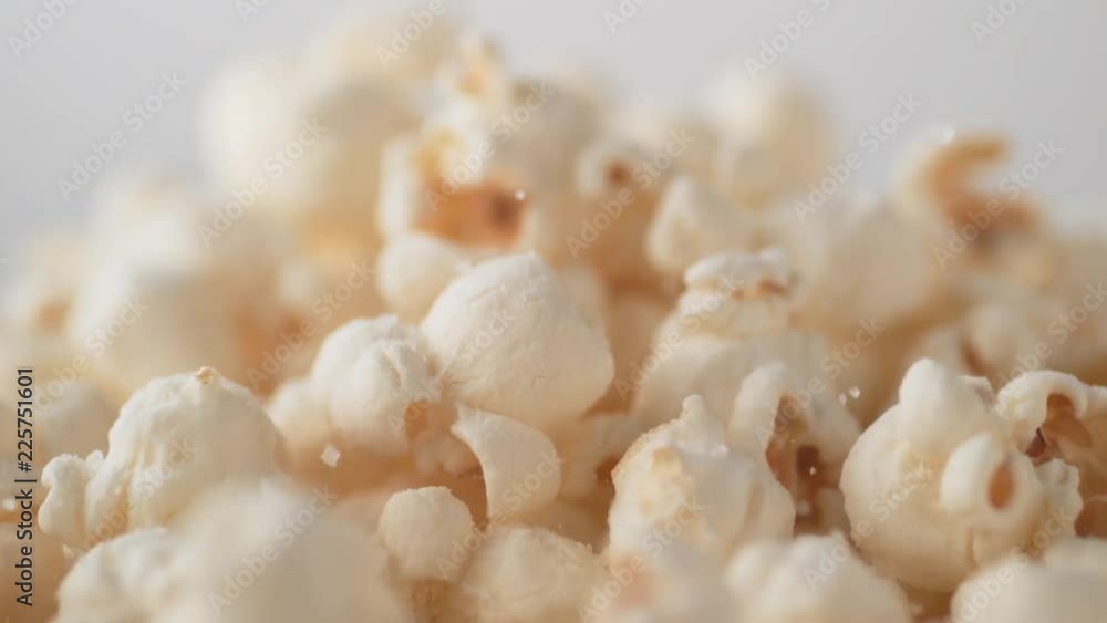 Loop of Putting salt over popcorn. Shot with high speed camera, phantom ...