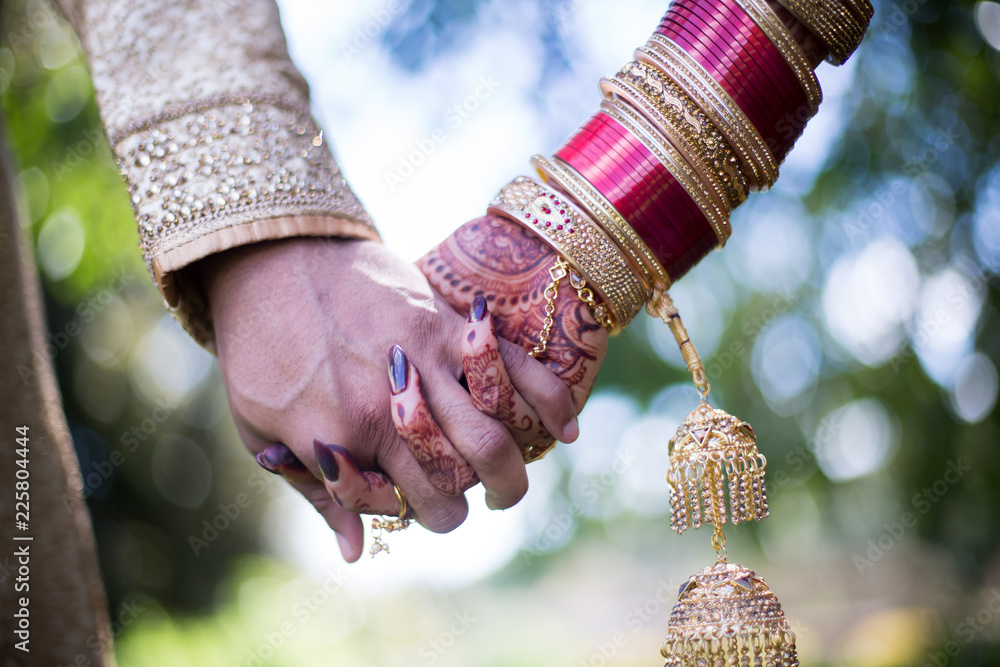 Indian couple's holding hands Stock Photo | Adobe Stock