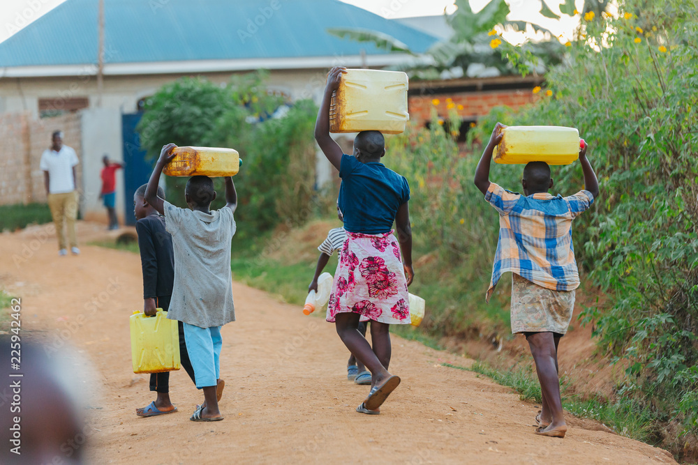 African Children Carrying Water