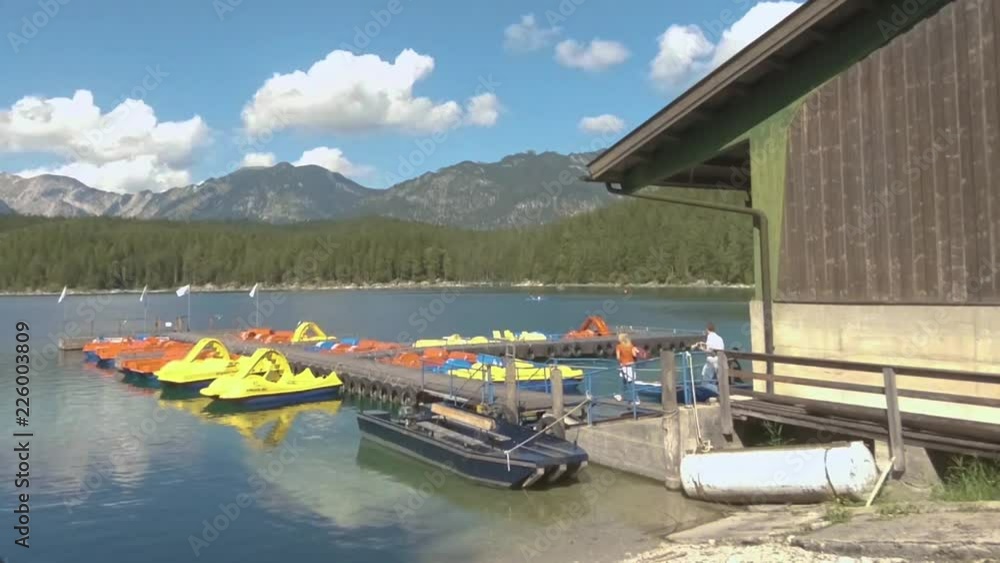 A boat rental on the famous "Eibsee" in Bavaria. The lake is located at ...