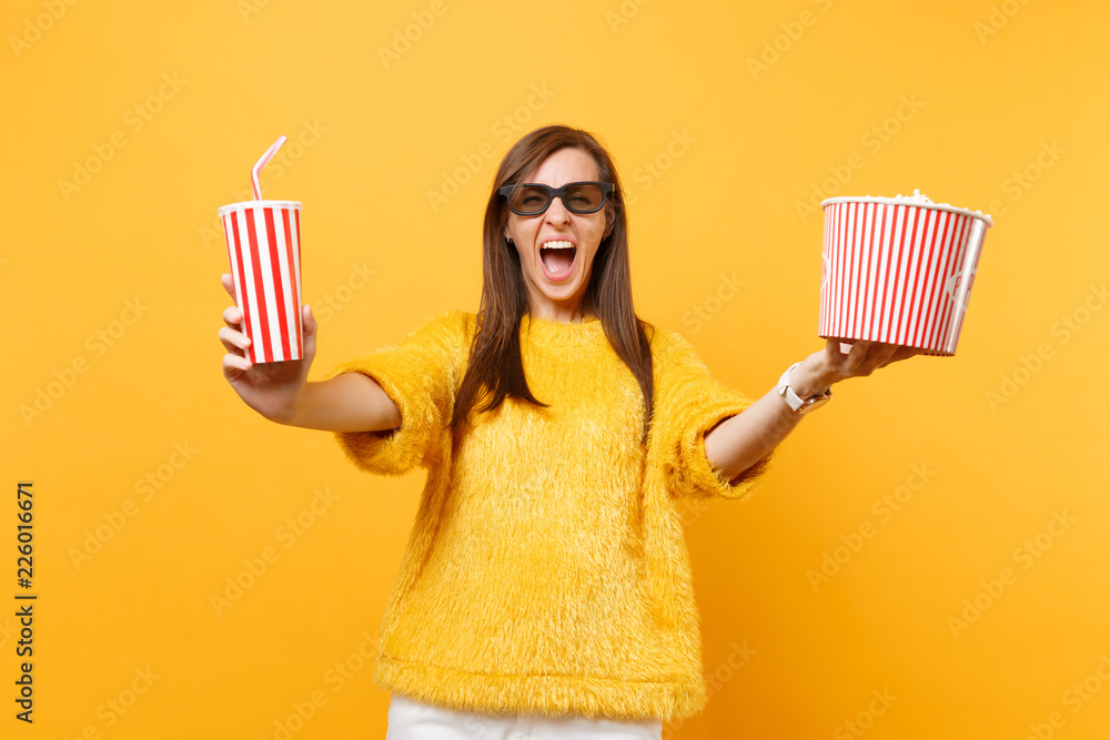 Crazy young woman in 3d imax glasses screaming, watching movie film ...