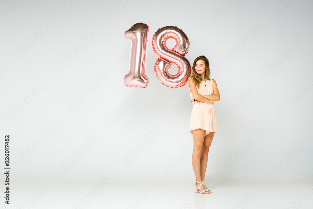 elegant woman with a number made from letters Stock Photo | Adobe Stock
