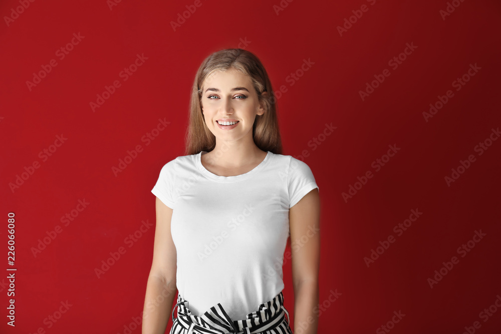 Portrait of beautiful young woman on color background Stock Photo ...