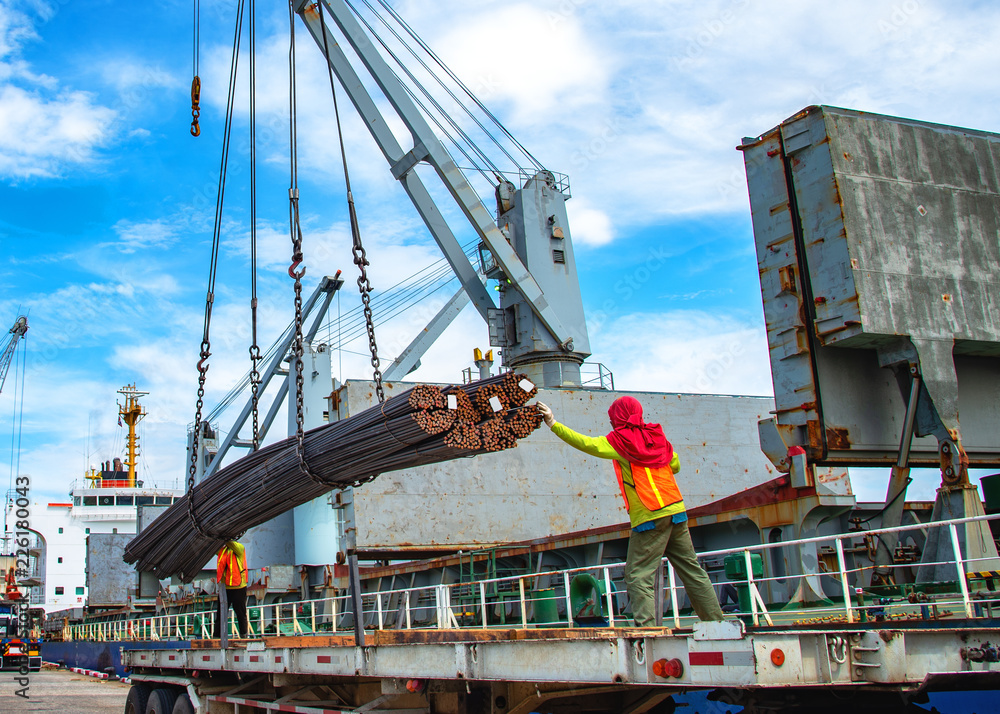 bundle of steel coils being loading discharging in port terminal ...