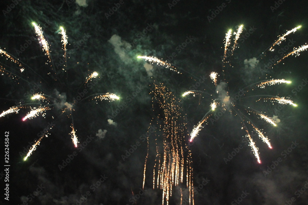 Fireworks. Salute. Sky background Amazing extravaganza of bright yellow ...