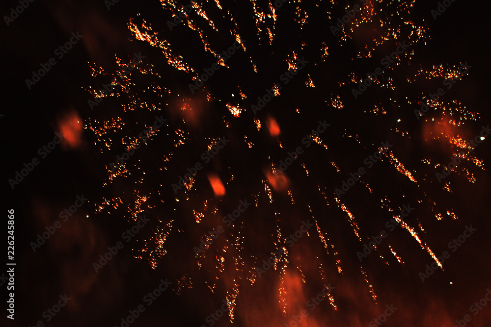 Fireworks. Salute. Sky background Amazing scattering of bright orange ...