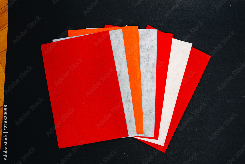 Red colored bright felt textile material. Samples of soft felt. Craft ...