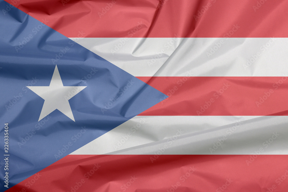 Fabric flag of Puerto Rico. Crease of Puerto Rico flag background ...