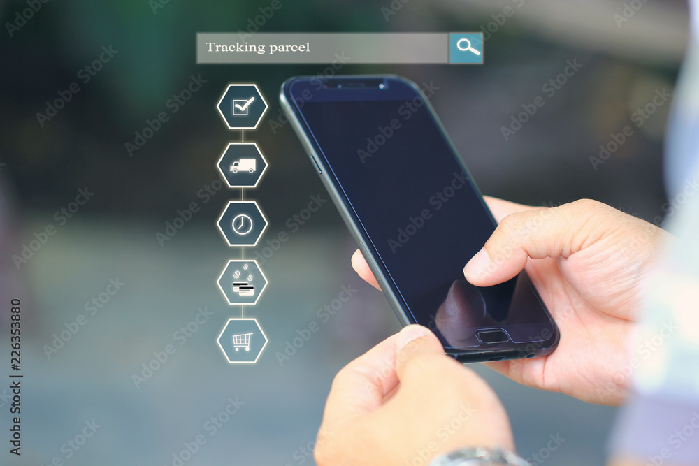Online shopping, Man hand holding smart phone and tracking parcel ...