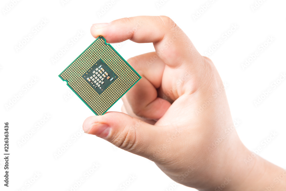 Hand holding CPU microchip computer processor isolated on white ...