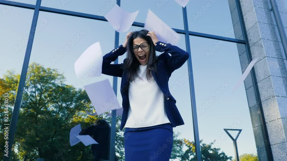 Angry furious female office worker throwing crumpled paper, having ...