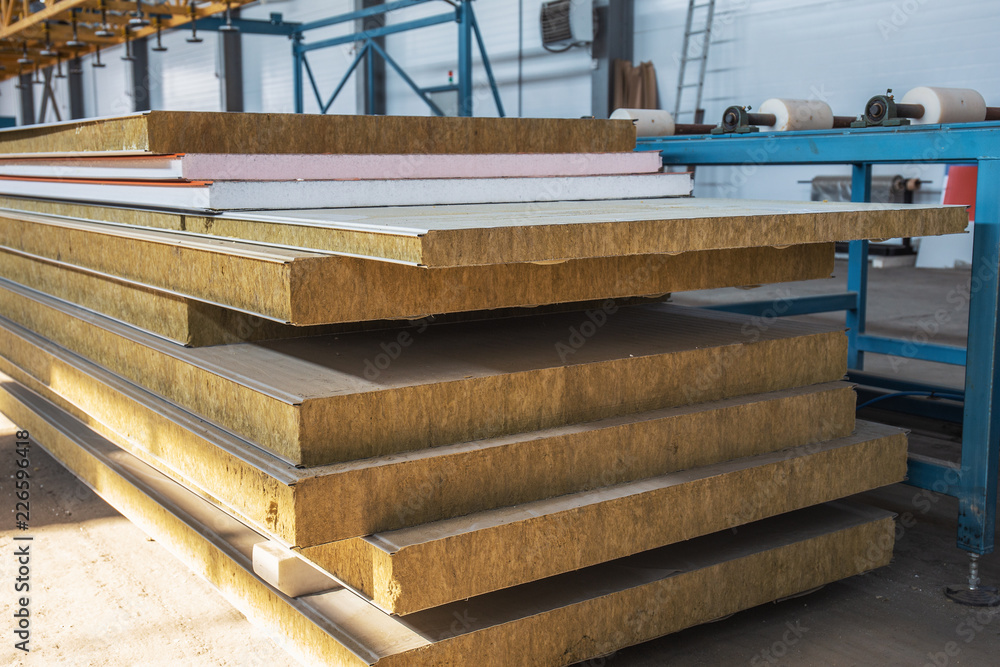 Stack of modern sandwich panel blocks from metal profile and wool foam ... Stack of modern sandwich panel blocks from metal profile and wool foam ...