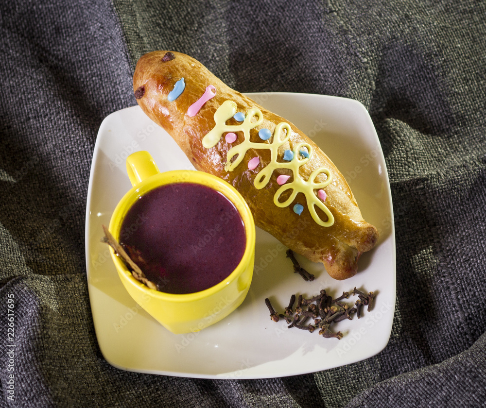 traditional dish and drink Ecuador, called: Colada Morada and bread ...