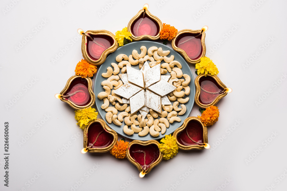 Diwali food Rangoli using Kaju Katli sweet along with Clay diya/lamp ...