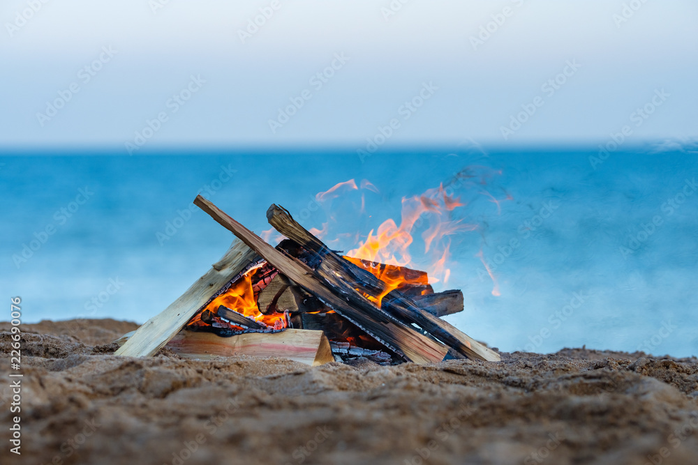 Daytime Bonfire On Beach