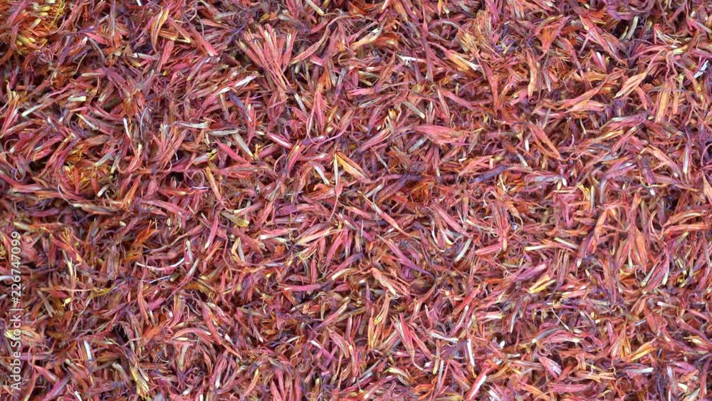 Saffron threads close up rotation loopable 4k top view. Food background ...