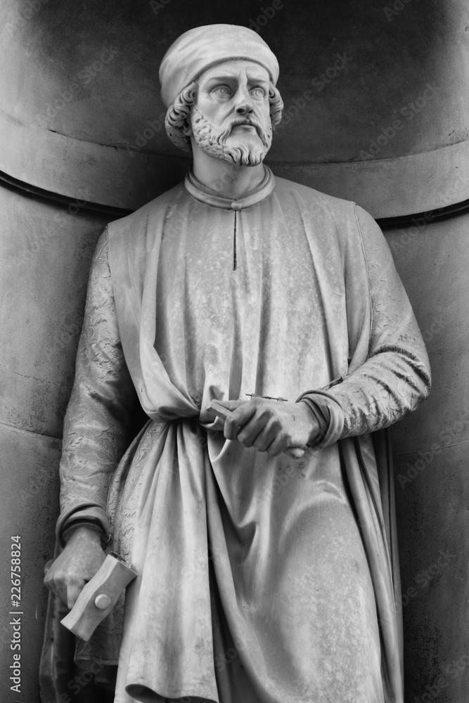 The statue of Donatello outside the Uffizi colonnade in Florence ...