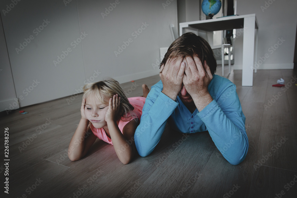 sad tired exhausted child with stressed father, family problems Stock ...