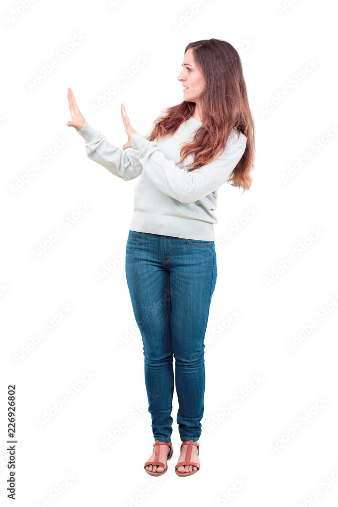 young pretty girl full body looking scared, frightened and horrified ...