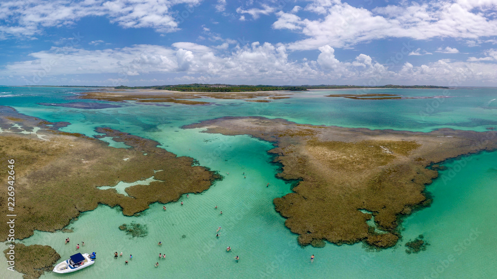 Aerial view of Moreré Reefs, Moreré Beach, during low tide, natural ...