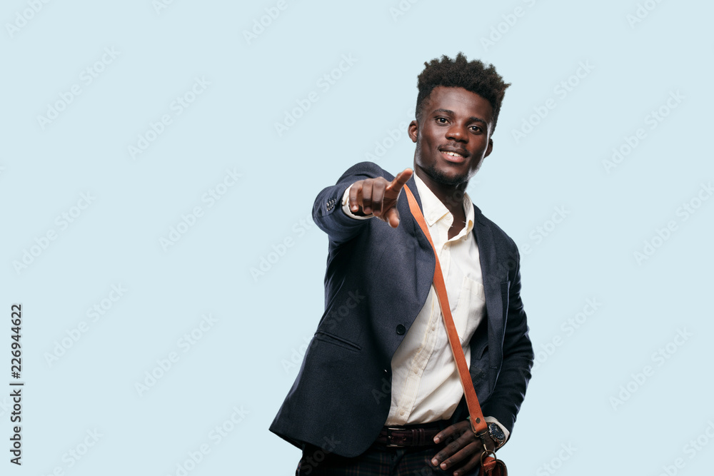 young black businessman laughing hard at something hilarious and ...