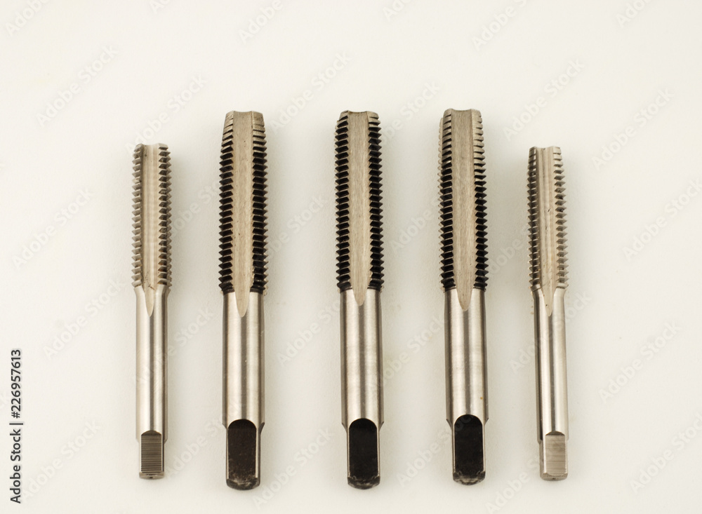 Cutting tool to make thread known as hand tap on white background Stock ...