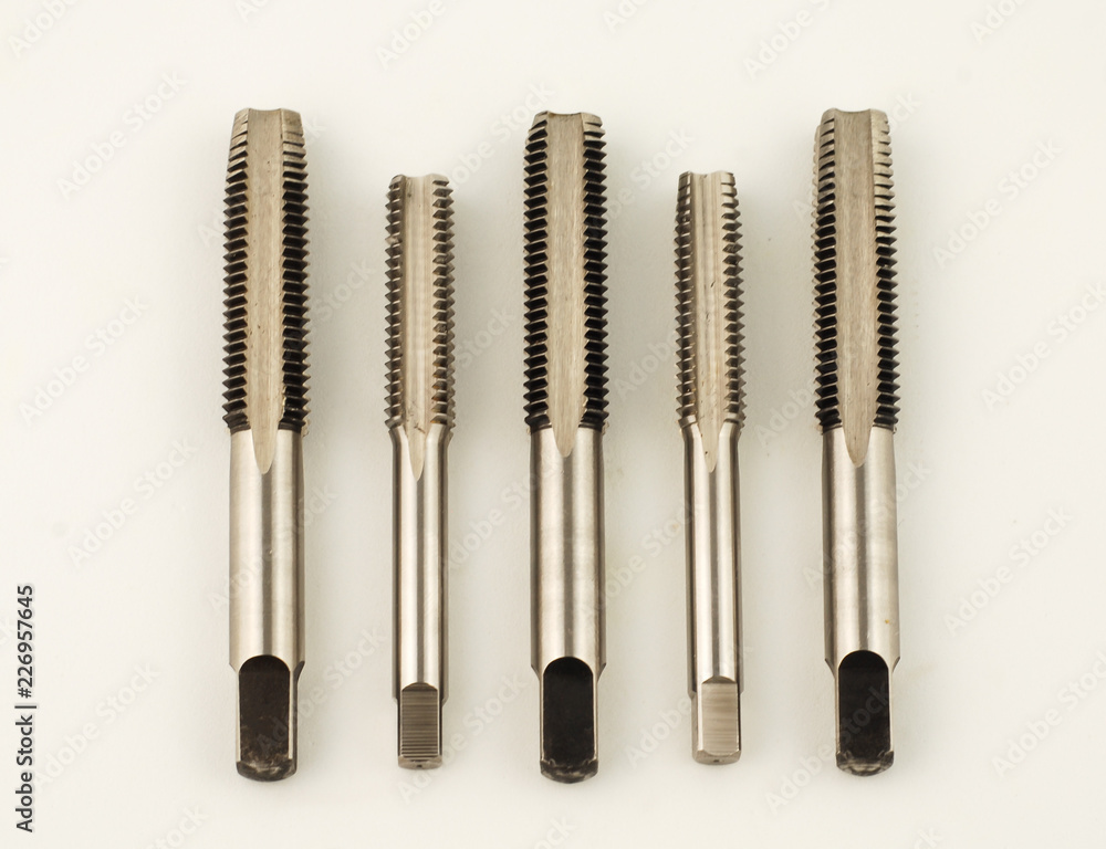 Cutting tool to make thread known as hand tap on white background Stock ...