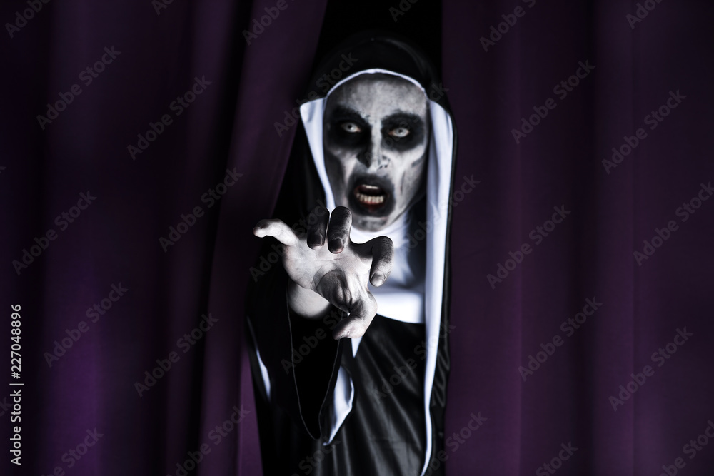frightening evil nun, in a black and white habit Stock Photo | Adobe Stock
